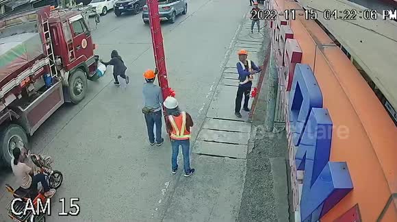Pedestrian knocked into path of oncoming truck before man saves her ...