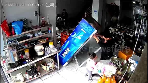 Chinese father saves daughter from being squashed by falling fridge ...