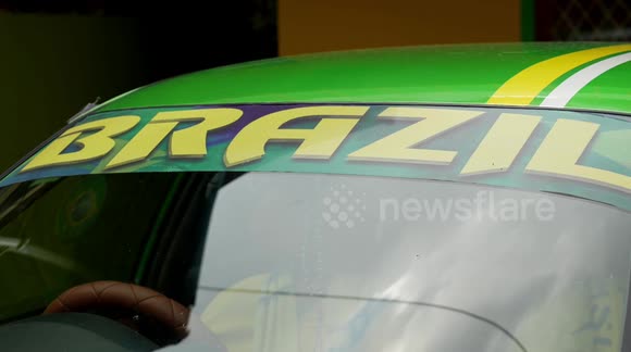 Die-hard Brazil fan paints HOUSE and car in nation's colours for World ...