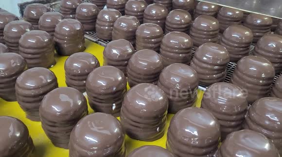 Palestinian workers prepare the vanilla candy known as "Ras El-abed or ...