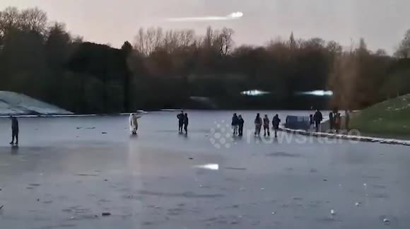 Shocking footage shows group of Brits sliding and skating on frozen ...