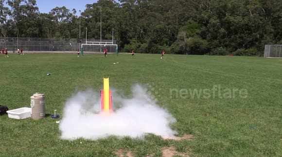 Science teacher shows students how to launch a rocket with liquid ...