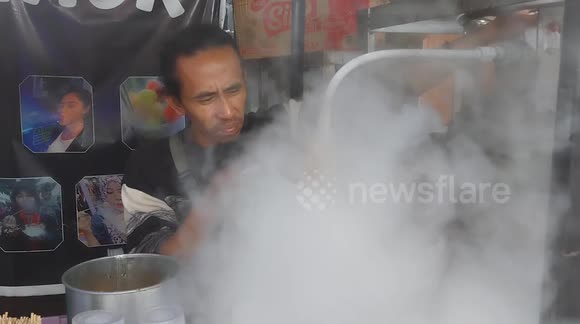 Popular 'dragon's breath' snack made from liquid nitrogen in Indonesia ...