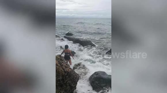 Tourist knocked over by massive wave in amusing beach photo fail - Buy ...