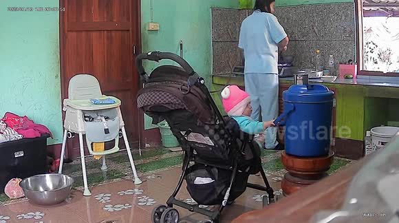 Curious baby pulls jar over spilling water over kitchen floor - Buy ...