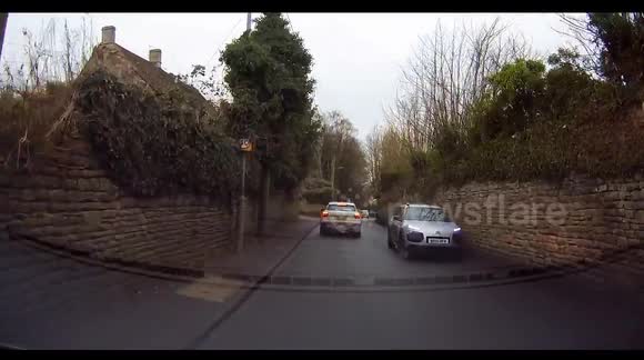 Dangerous driving UK car swerves onto the wrong side of the road. Scary ...