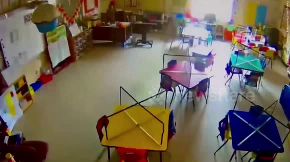 CCTV captures moment deer smashes through window of Alabama elementary ...