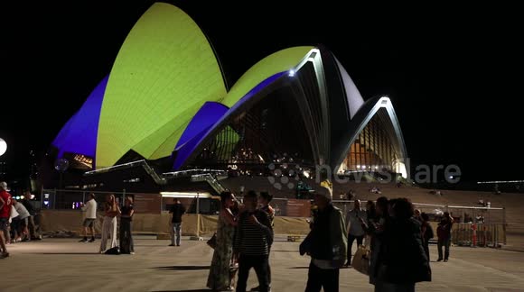 Sydney Opera House is lit up on first anniversary of the invasion of ...