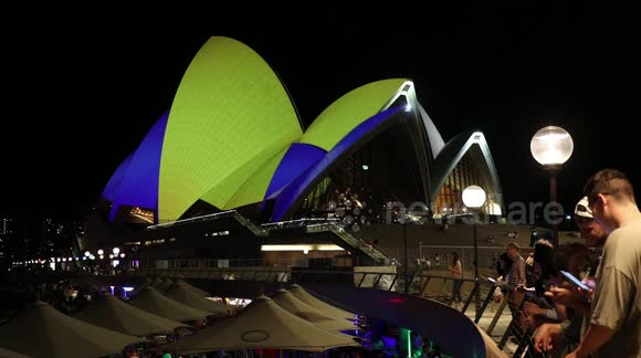 Sydney Opera House is lit up on first anniversary of the invasion of ...
