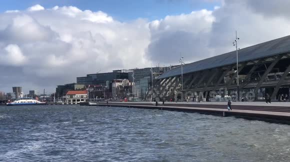 New riverside boardwalk opened up in Amsterdam - residents and tourist ...