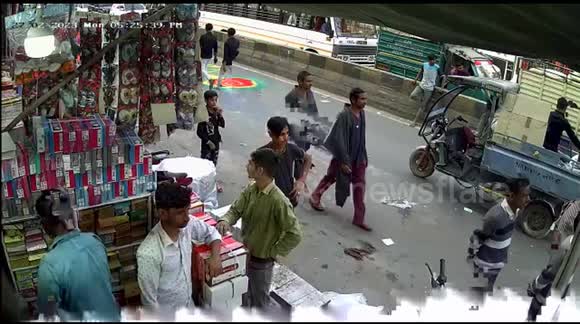 Passersby cower as rickshaw carrying firecrackers explodes in northern India - Buy, Sell or ...