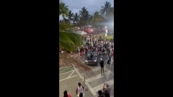 Spring break madness: Revellers jump on vehicles as Miami Beach rejects ...