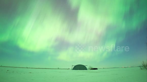 Watch as a magnificent aurora borealis display lights up the skies of ...