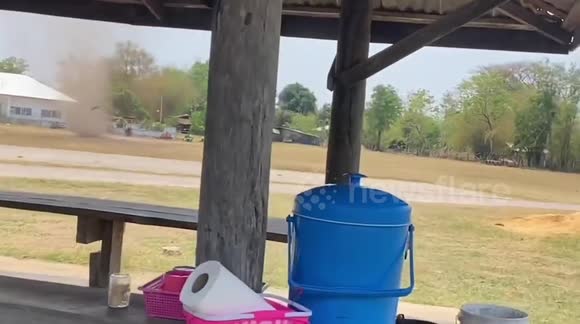 Dust devil whirls across street in Thailand - Buy, Sell or Upload Video ...