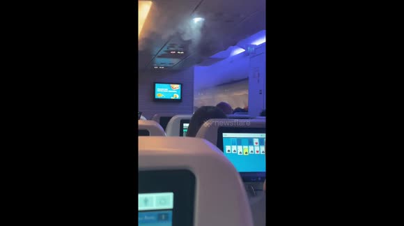 Warm outdoor air creates steam inside cold airplane cabin in Costa Rica ...