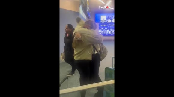 Girl waiting for her sister at airport gets surprised after mom pops up ...