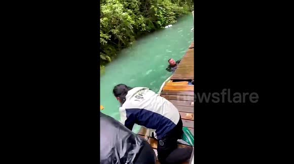 Minibus plunges into water on floating bridge, killing 5 in central ...