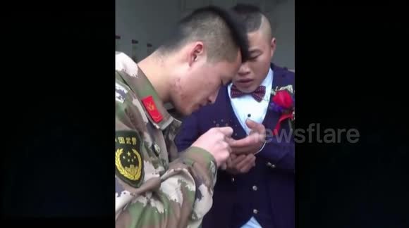 Firefighter helps groom take out wedding ring getting stuck on his ...