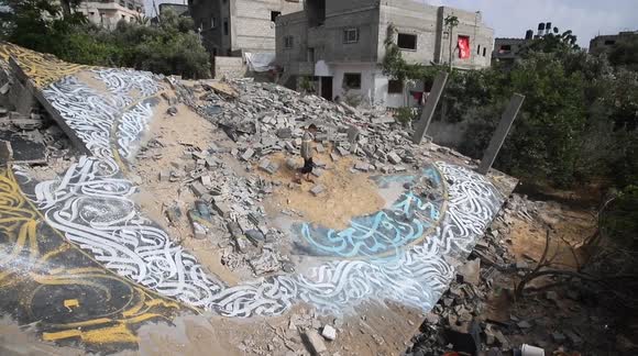 Remains of impressive mural scattered after Israeli airstrike destroys ...