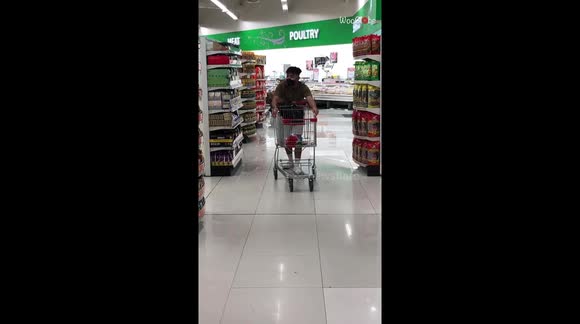 Man trying to ride a shopping cart tips it on himself *Hilarious fail ...