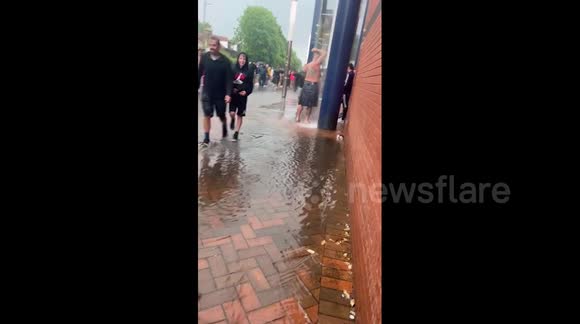 Liquid football! Fan showers as rain pours from stadium after Scotland ...