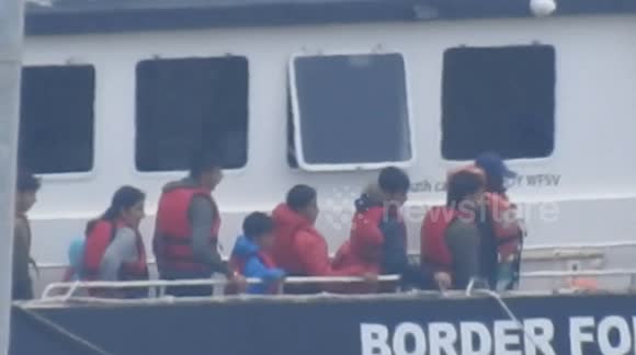Border Force Defender returns to Dover with women, children and men ...