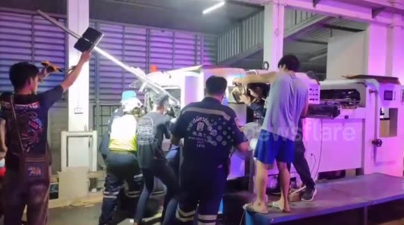 Worker with head jammed in paper-cutting machine rescued at factory in ...