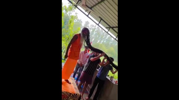 Indian monk becomes celebrity with his 15-foot-long dreadlocks that ...