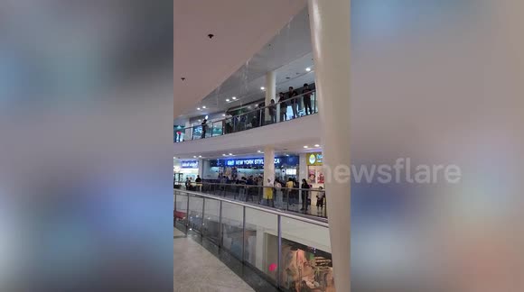 Rain pours through shopping mall ceiling during storm in the ...