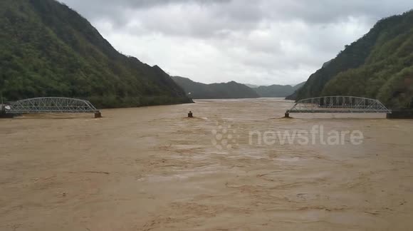 Bridge collapses during floods from typhoon in the Philippines - Buy ...