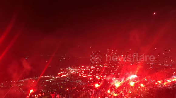 Algerian football fans turn city red with incredible pyrotechnic ...
