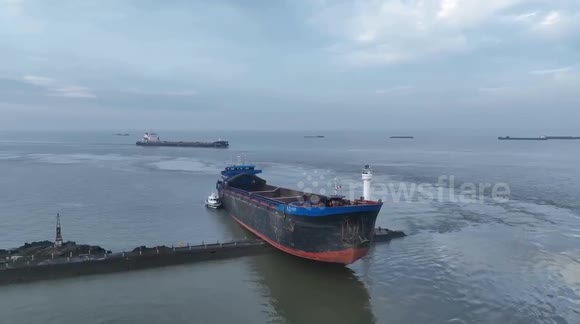 Huge cargo ship stranded on trestle in shallow waters in China - Buy ...