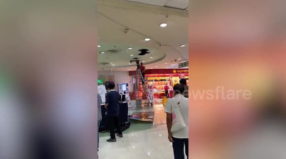 Shopping mall ceiling collapses during heavy rain in Thailand - Buy ...