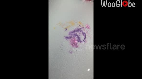 Artist creates a beautiful butterfly-wing pattern on a vase using ...