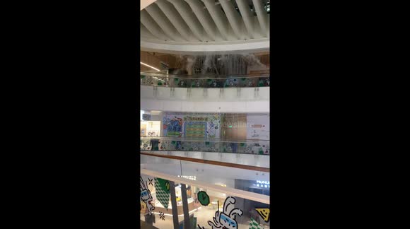 Roof mall leaks amid heavy rainfall at Caohejing In-City Mall, Shanghai ...