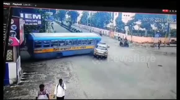 Dramatic CCTV of speeding bus smashing into car and flipping over in ...