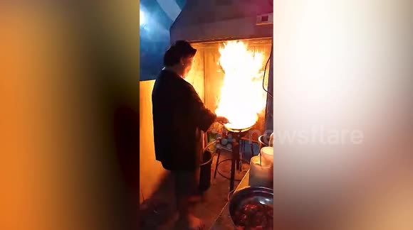 Chef shows off his seriously flame-grilled meat with fiery wok - Buy ...