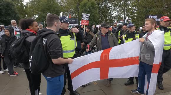 Met Police warn two Londoners holding England flag that they may face ...
