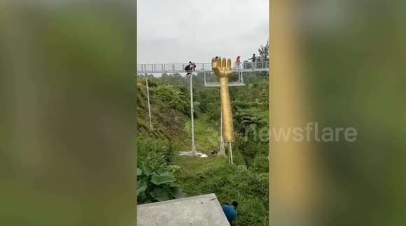 Tourist dies in fall from shattered glass bridge in Indonesia - Buy ...