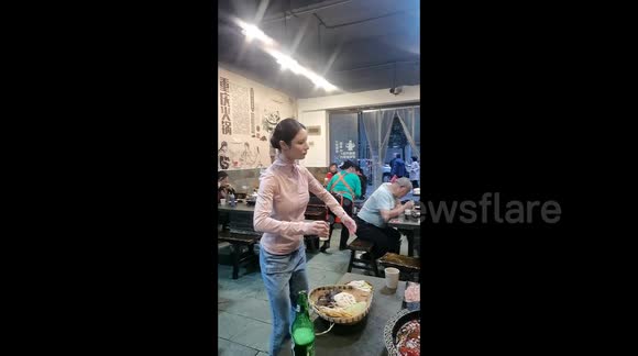 Chinese restaurant owner stuns diners with robotic serving skills - Buy, Sell or Upload Video ...
