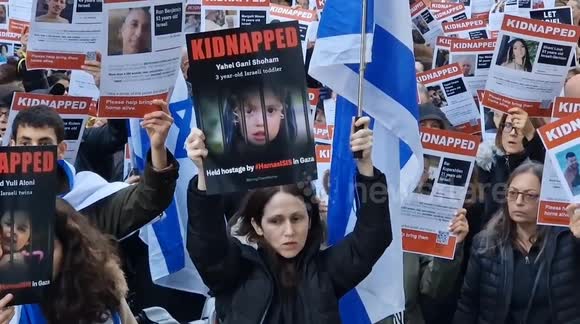 Hundreds hold 'kidnapped' posters outside London's Qatari embassy ...