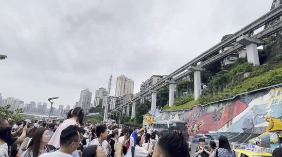 Chongqing, china: spectacular trains passing through building tunnel ...