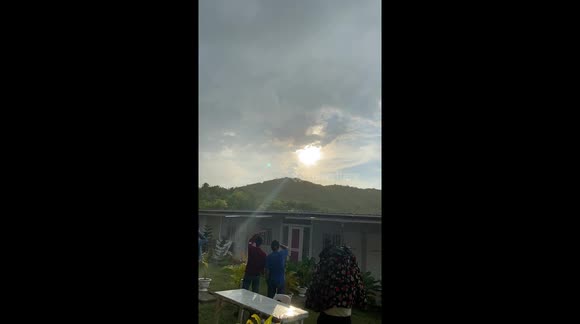 Awestruck residents cheer as they witness rare 'dancing sun' phenomenon ...