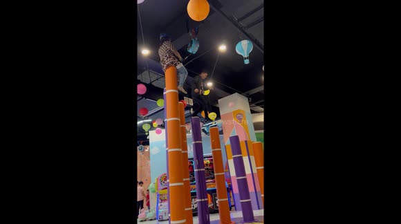 Girl falls from indoor climbing platform after safety harness fails ...