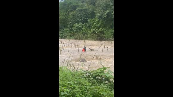 Father washed away by raging flash flood rescued by locals - Buy, Sell ...