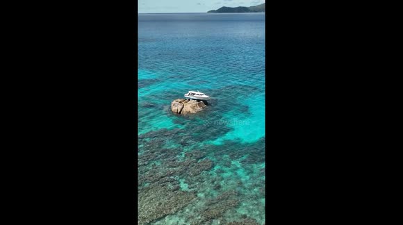 Boat Gets Bizarrely Stuck on a Rock - Buy, Sell or Upload Video Content ...