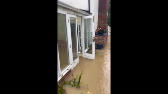 Bloke cracks open beer while watching devastating flood cause £5,000 ...