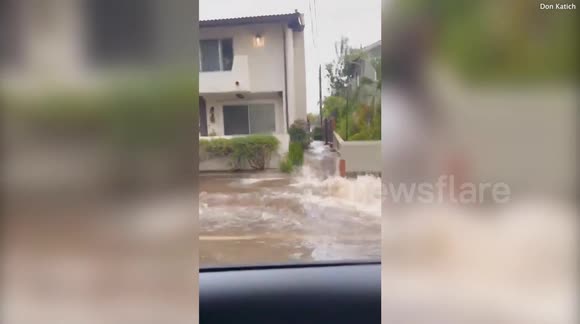 Video shows flash flooding rushing past apartment complex in Santa ...