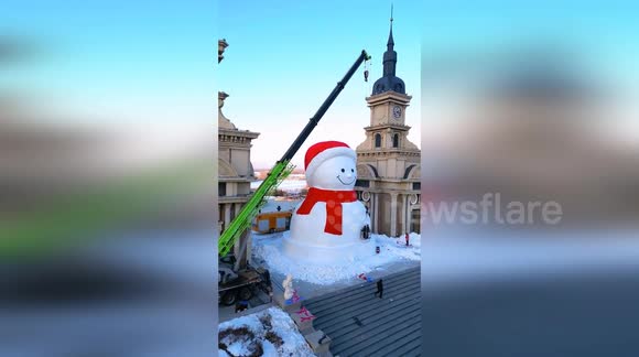 Giant 59ft tall snowman transforms Chinese city into a winter ...