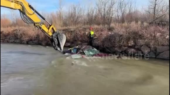 Criminal's Daring River Escape Foiled: Stolen Car Rescued by Excavator ...